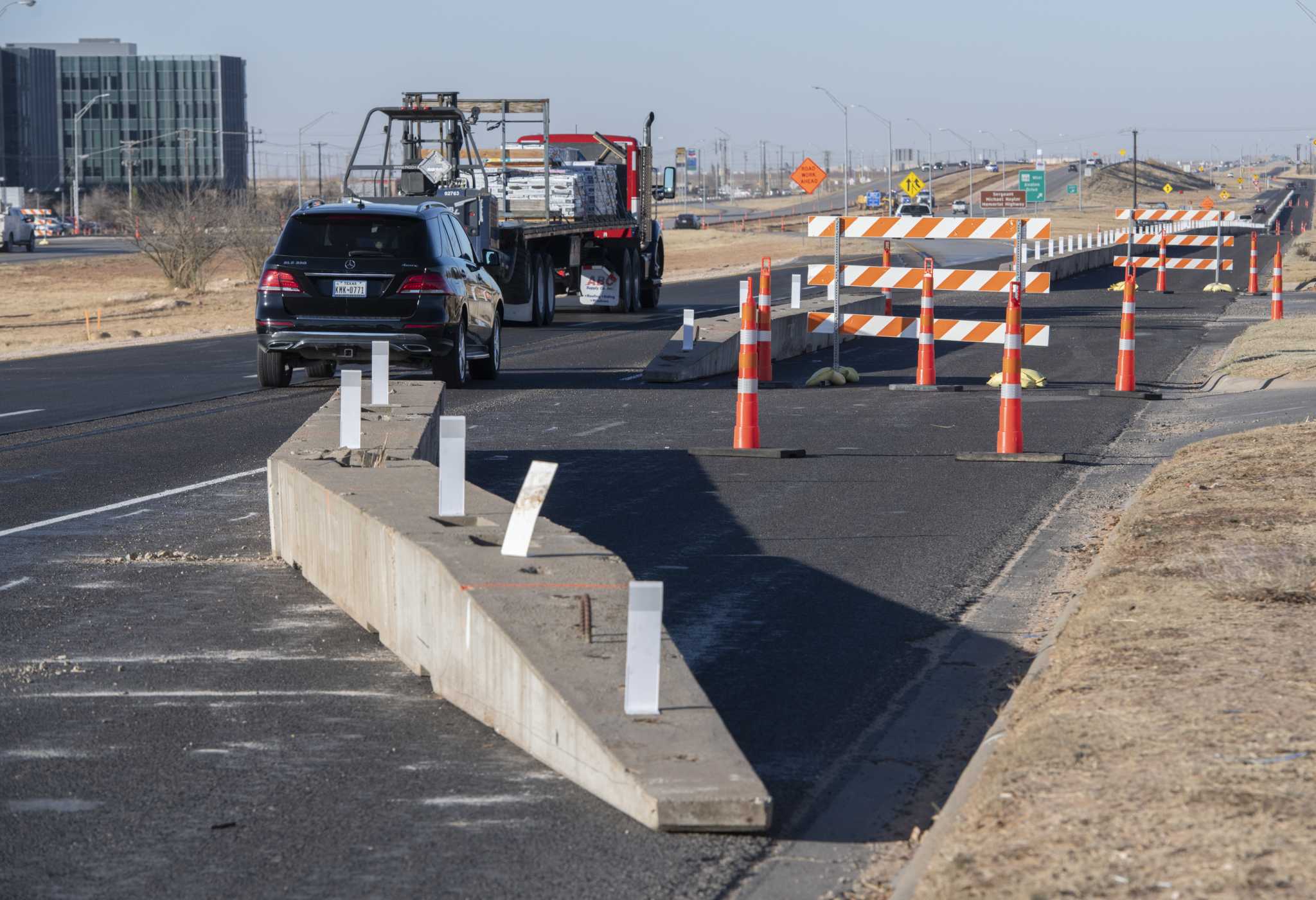 Project at loop-SH 191 to reverse entrance, exit ramps