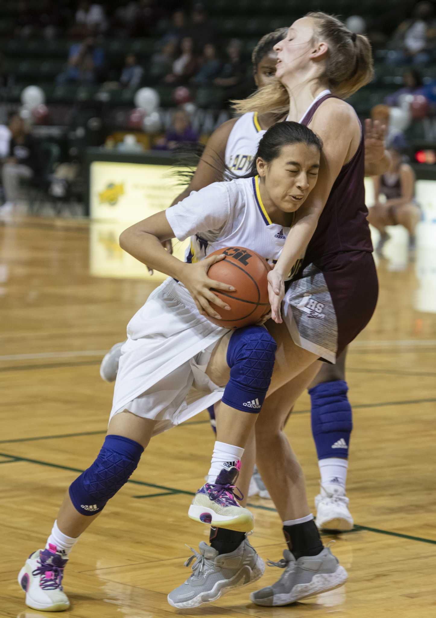 HS GIRLS BASKETBALL: LHS, MHS open District 2-6A with rivalry game