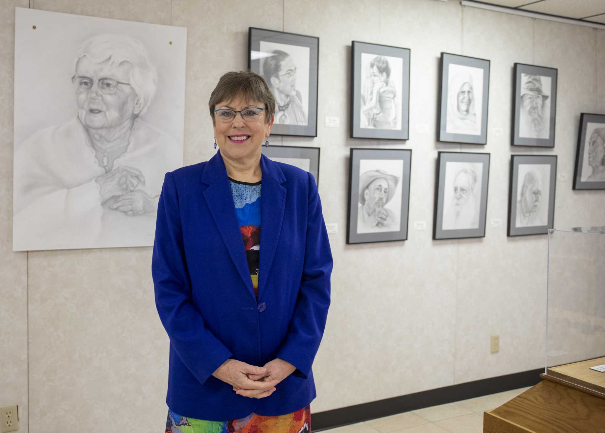 Local artist showcases her largest portrait exhibit at Sibley Nature Center