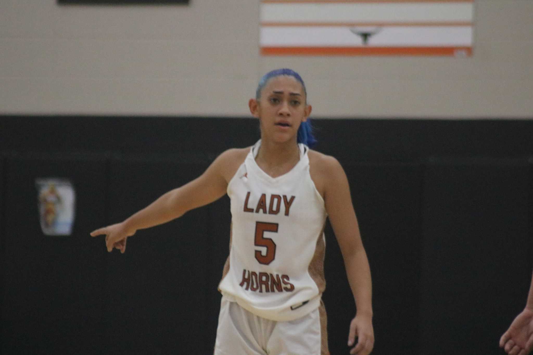 Dobie grabs share of first place after cooling off Lady Deer