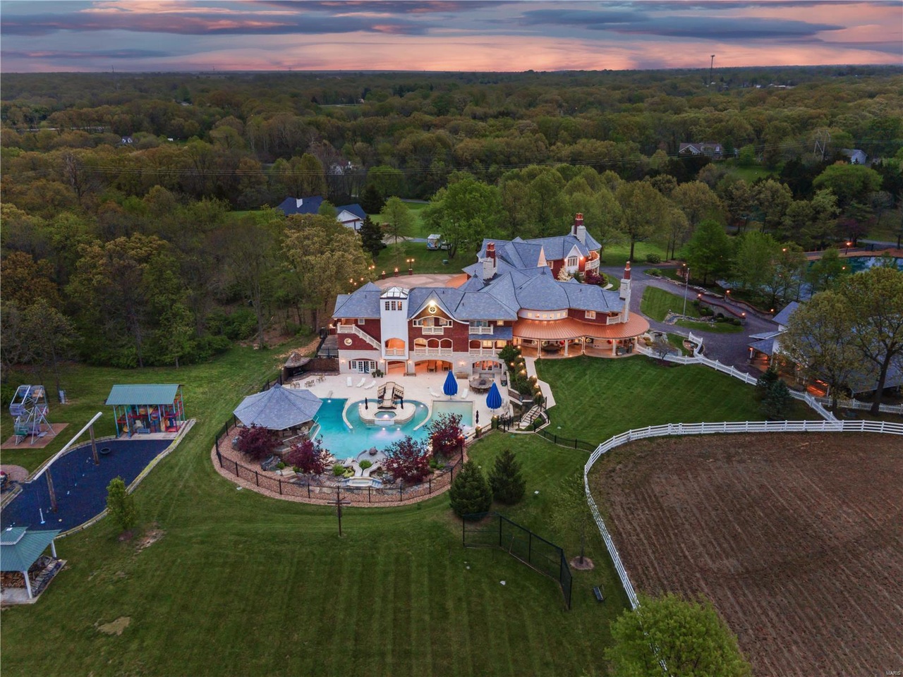 $20M Missouri mansion for sale has Ferris wheel, chapel, bowling lanes ...