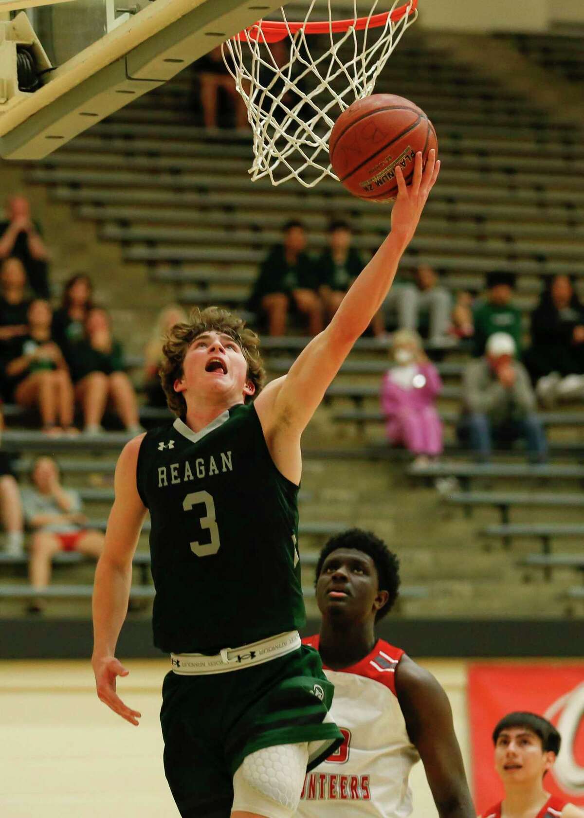 Boys basketball: No. 1 Reagan’s balanced offensive effort levels LEE