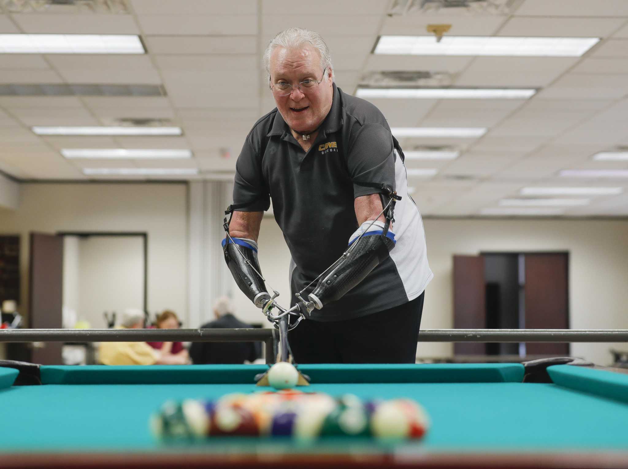 Prosthetic pool player racks up points, pals in Conroe