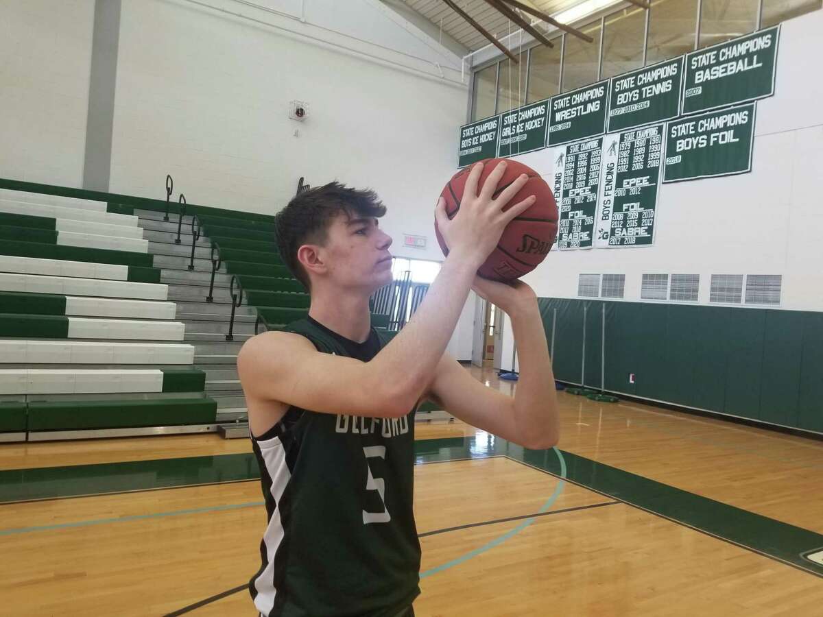 Justin Hess excels on basketball court, in soccer net for Guilford