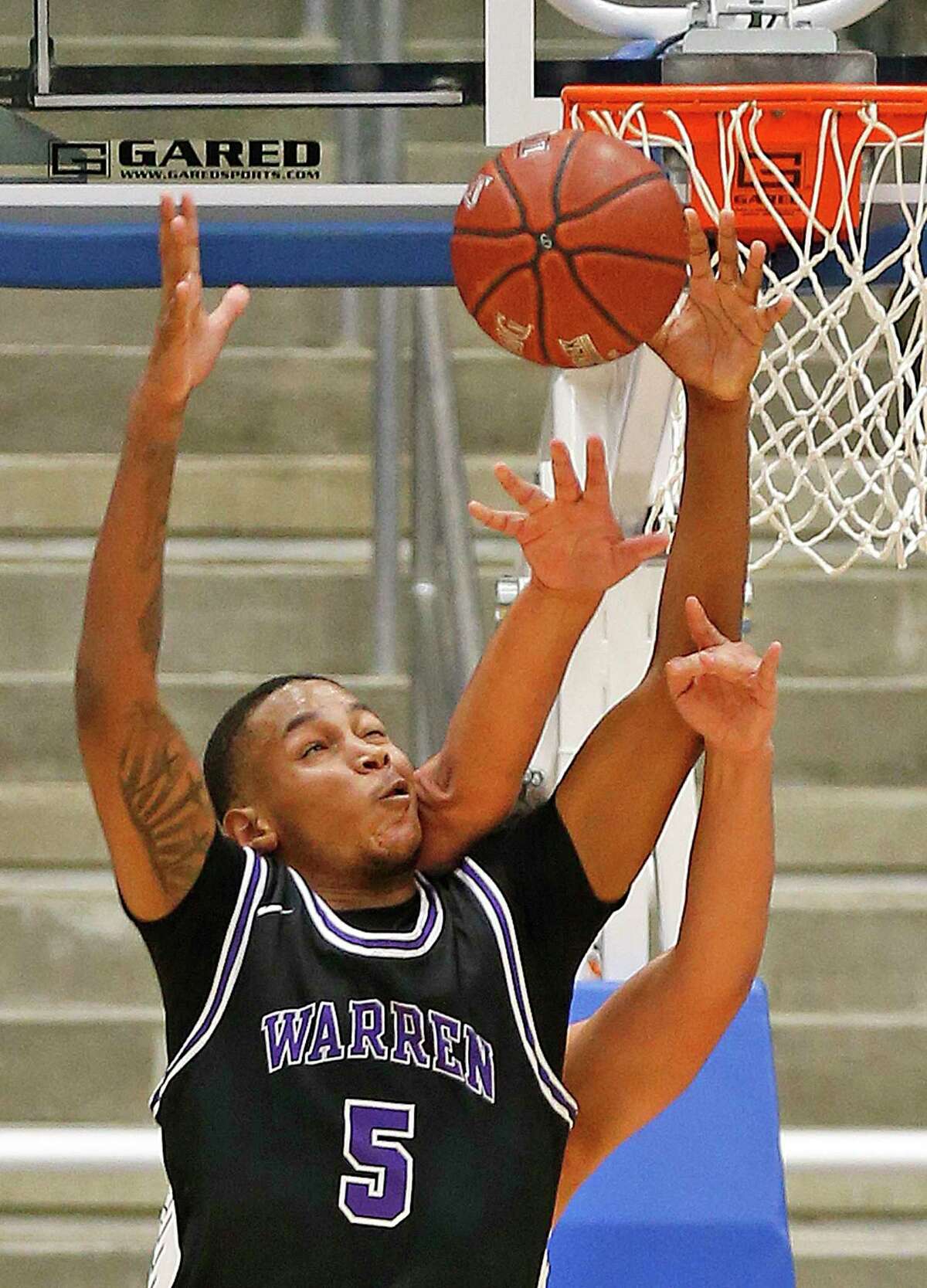 Boys basketball: Jaylen Crocker-Johnson helps Warren maintain second in ...