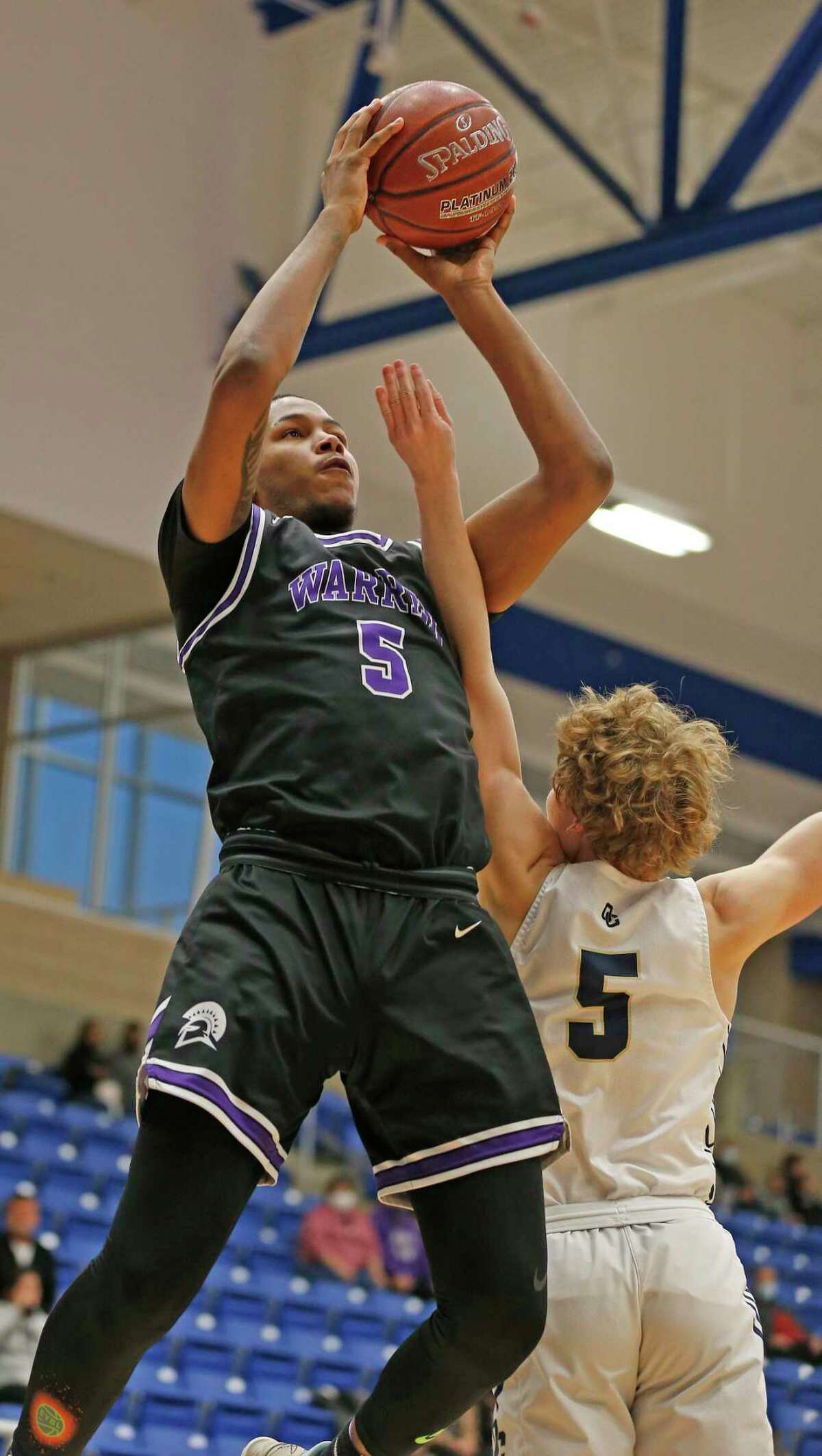 Boys basketball: Jaylen Crocker-Johnson helps Warren maintain second in ...