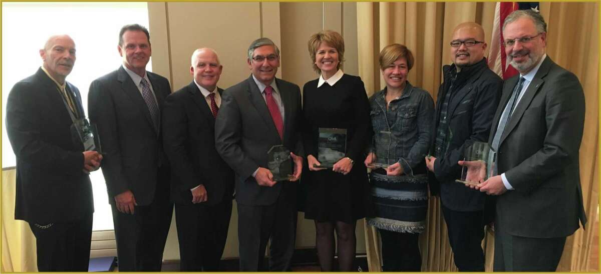 Lux Bond & Green owner honored at association awards luncheon