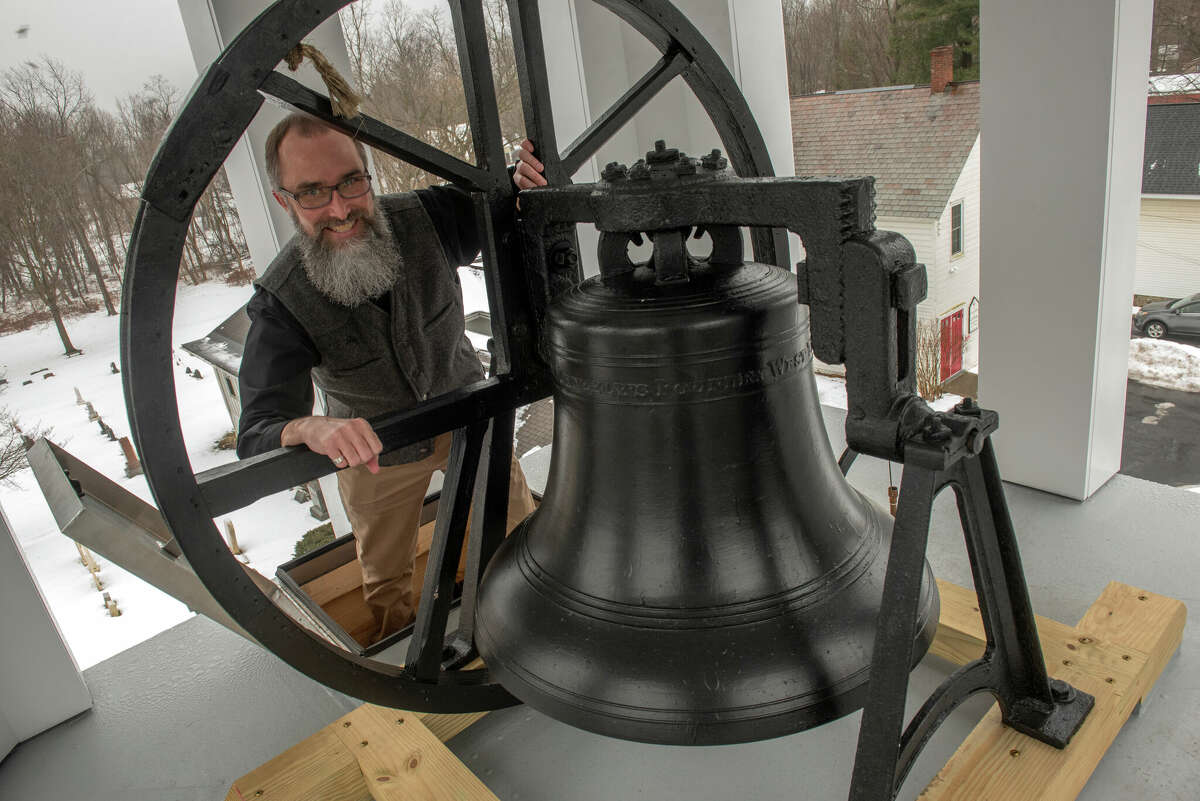 High above it all, church bells resonate with their community