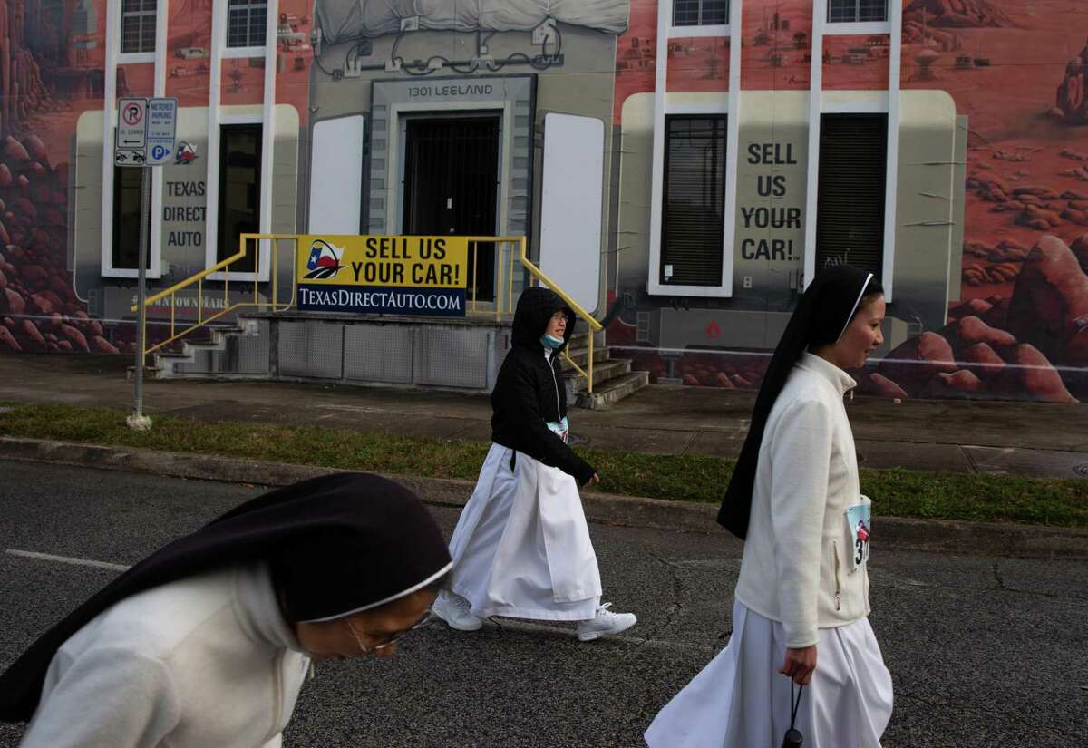 While waiting out MLB lockout, “Rally Nuns” run through downtown ...