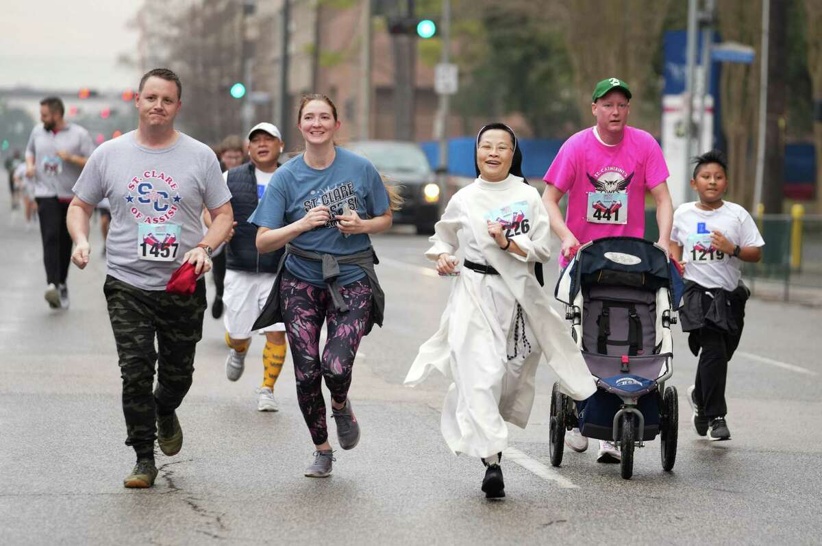 While waiting out MLB lockout, “Rally Nuns” run through downtown ...