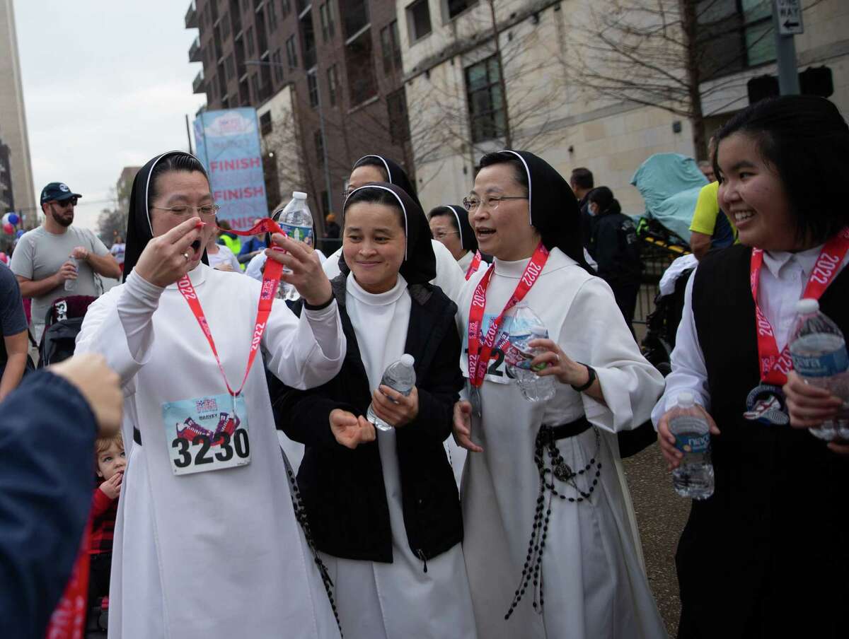 While waiting out MLB lockout, “Rally Nuns” run through downtown ...