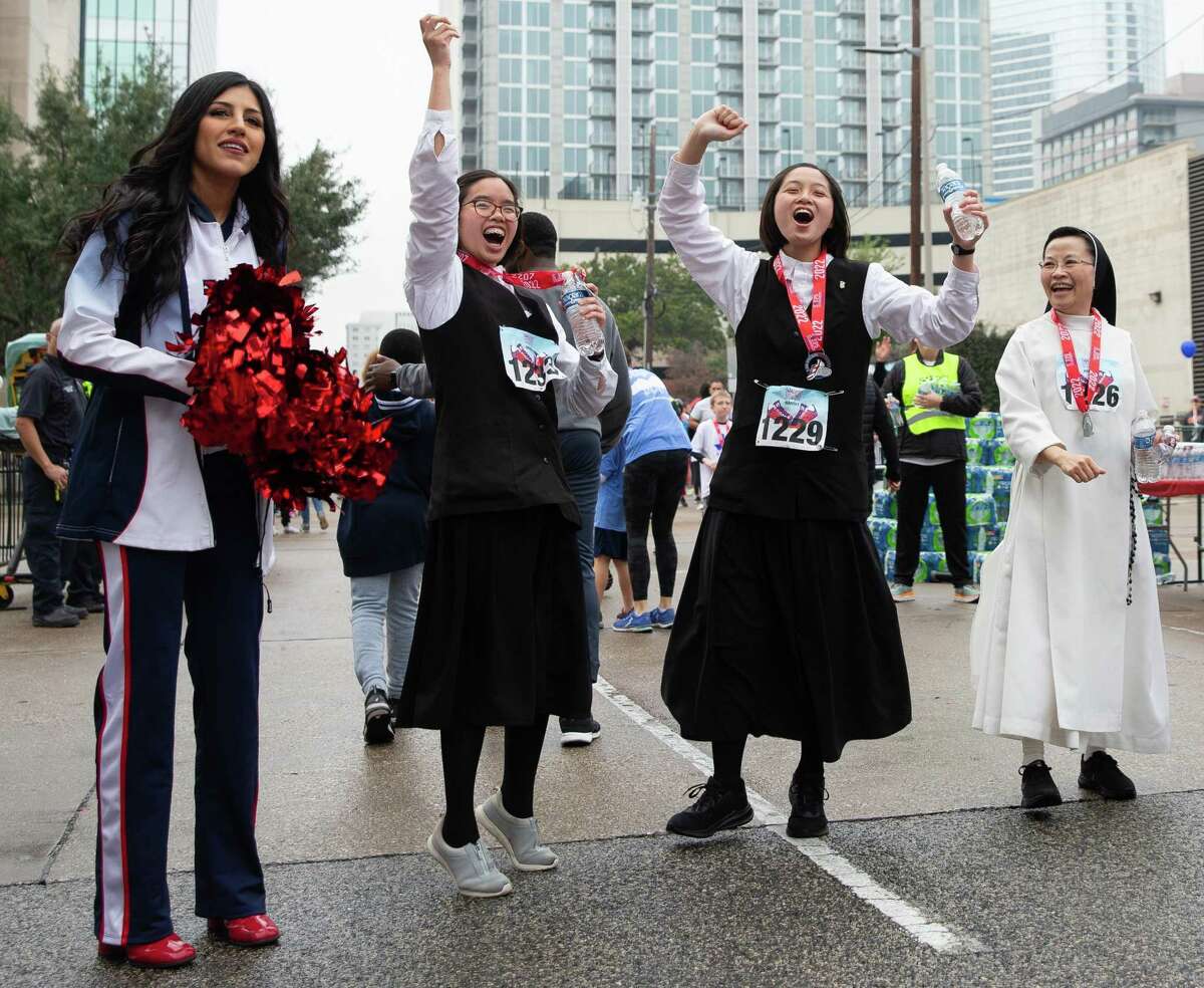 While waiting out MLB lockout, “Rally Nuns” run through downtown ...