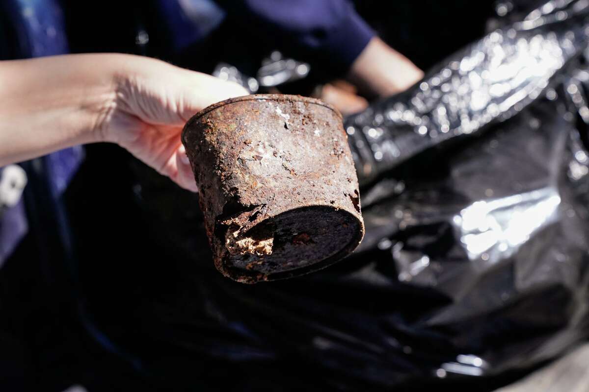 On the lookout for trash: Cavers clean century-old contaminants from ...