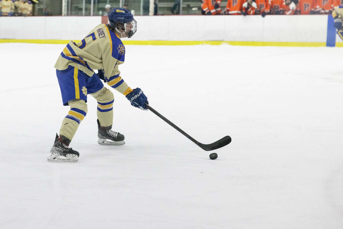 Chemics battle hard, but No. 1 Powers dominates second period