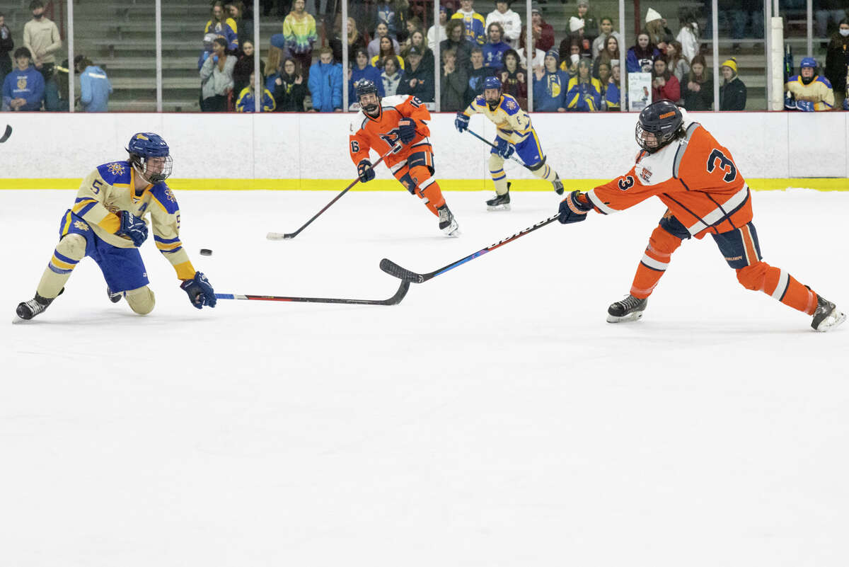 Chemics battle hard, but No. 1 Powers dominates second period