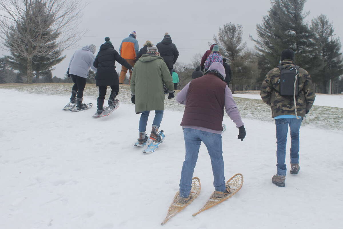 Photos: Hikers brave frigid temps for Stomp Out Cancer Fund's snowshoe walk