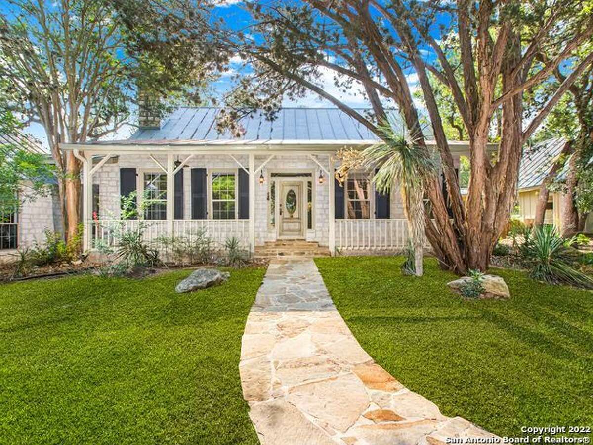 Boerne ranchette with a man-made creek running through the home lists ...