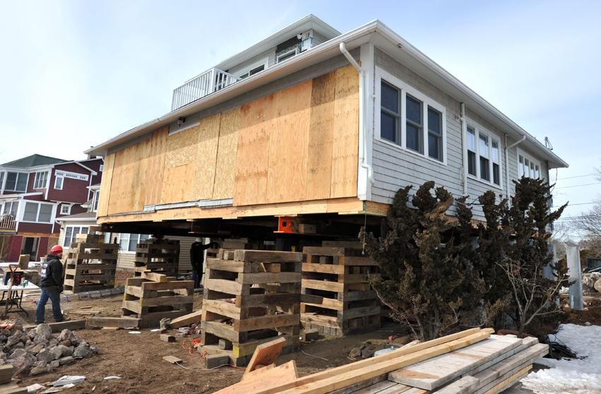 House raising: Branford home raised during epic winter