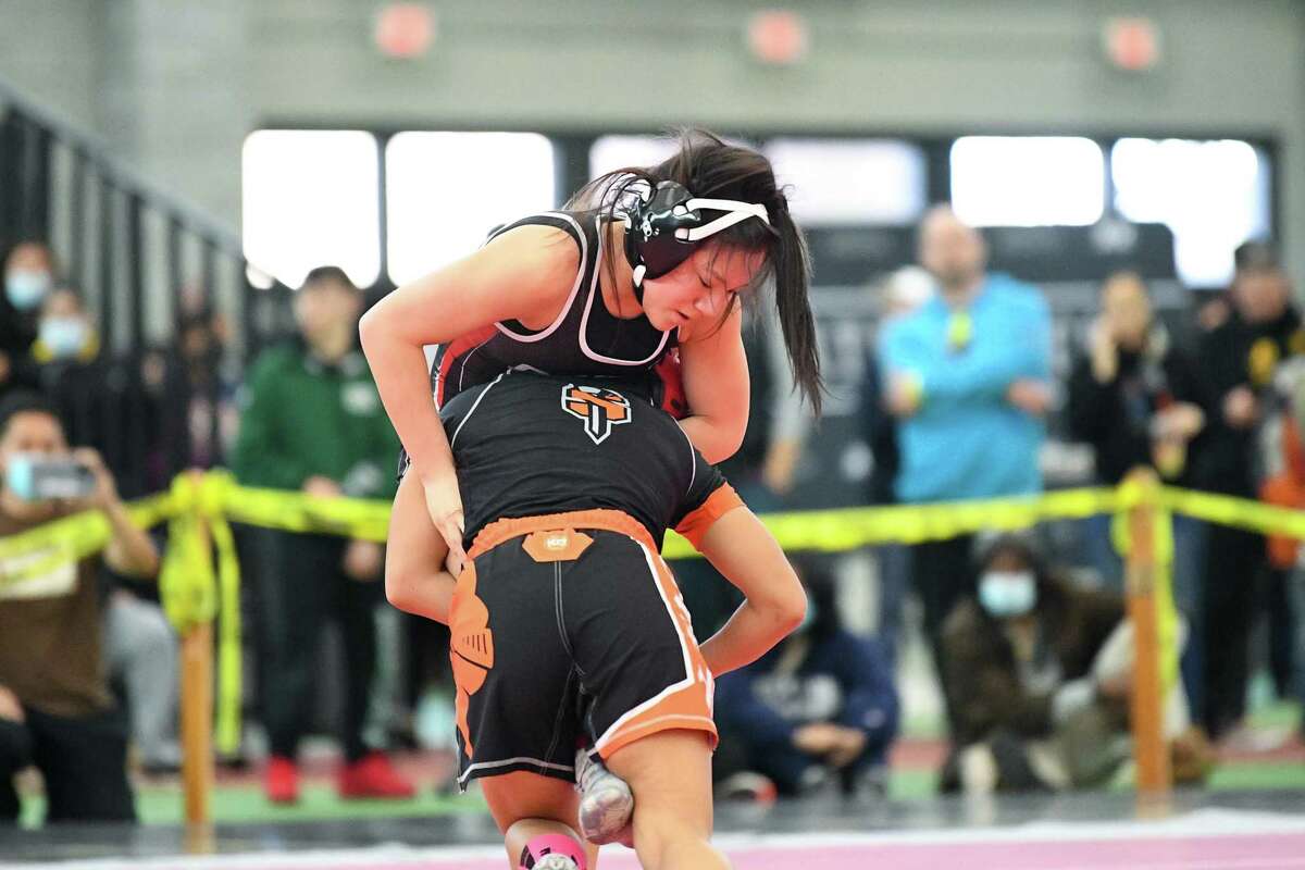 Amity girls wrestling team wins state’s first CIAC state championship