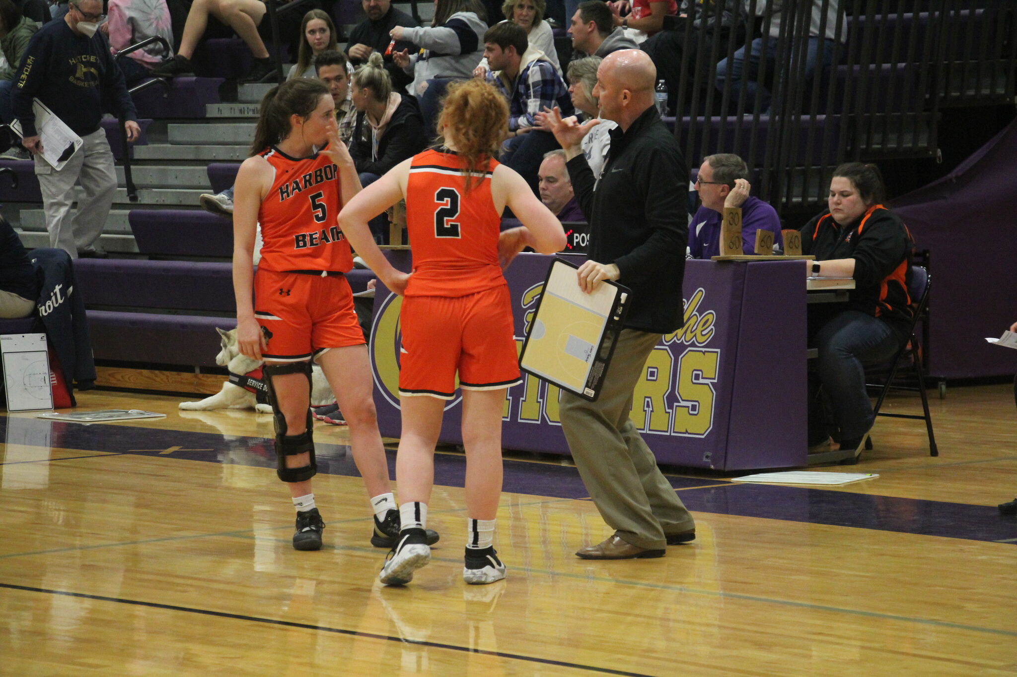 What happens in the day to day life of an coach who's also a teacher?