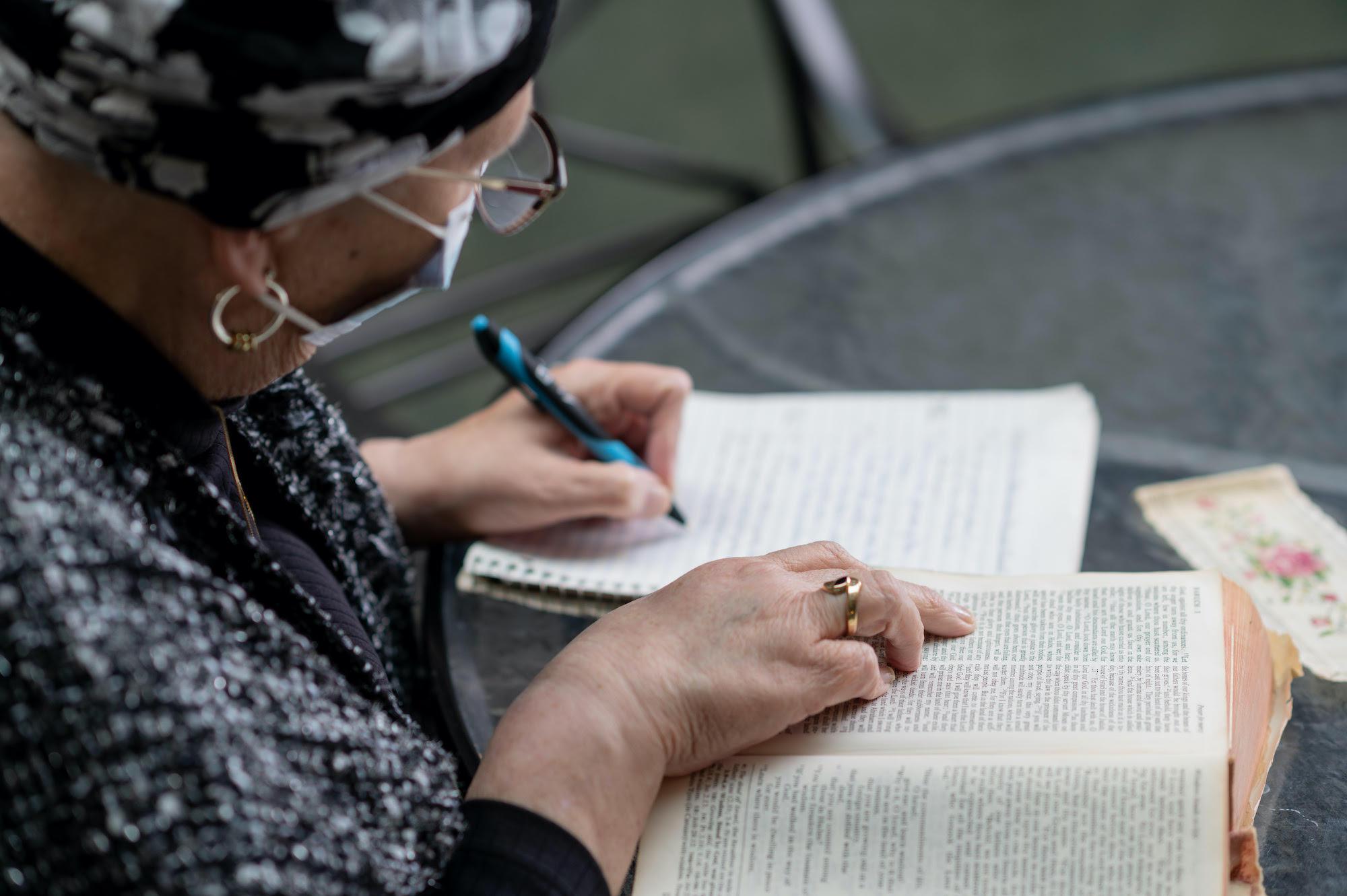 MD Anderson patient has written the Bible by hand in her notebooks. The ...