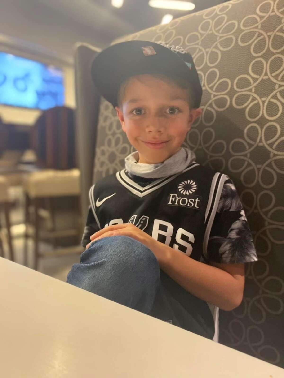 He's the Spurs' unofficial 'hype' man. He's also 10.
