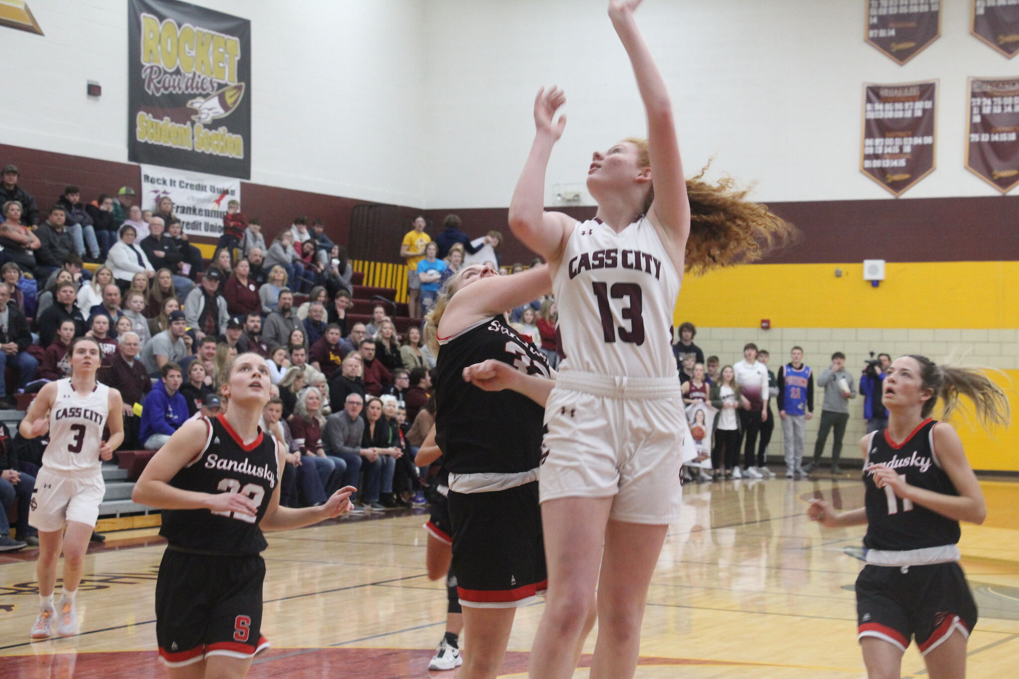 How do multi-sport athletes help their teams and stay in shape?