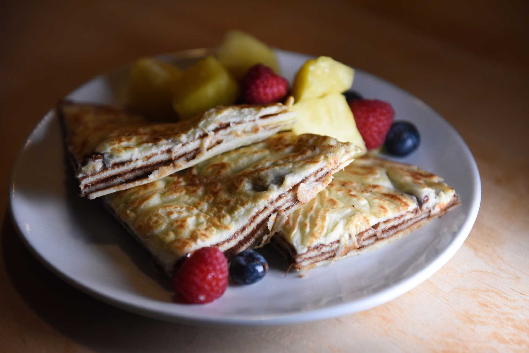 Before collegiate journey, cooking up son's favorite dishes