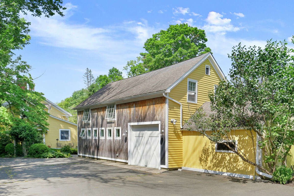 Renovated antique Newtown colonial with 1920s barn listed for under $1M