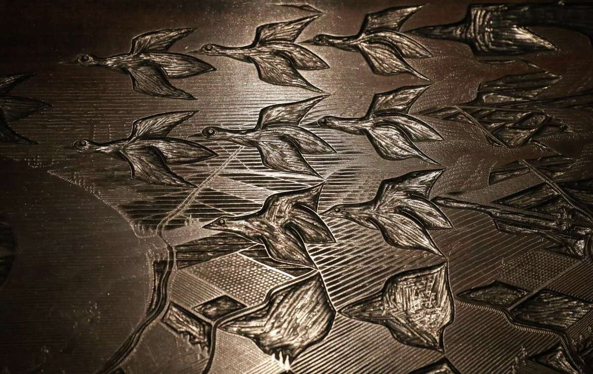 M.C. Escher exhibition presents strange realities and reptiles at the MFAH