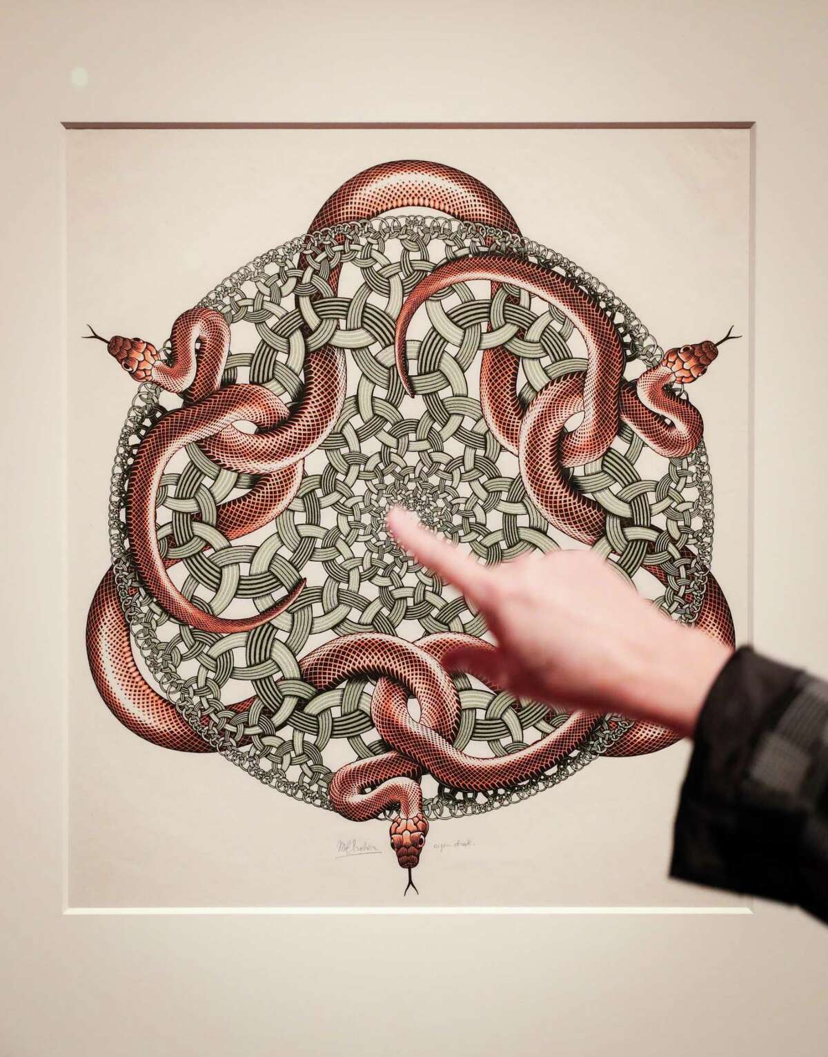 M.C. Escher exhibition presents strange realities and reptiles at the MFAH