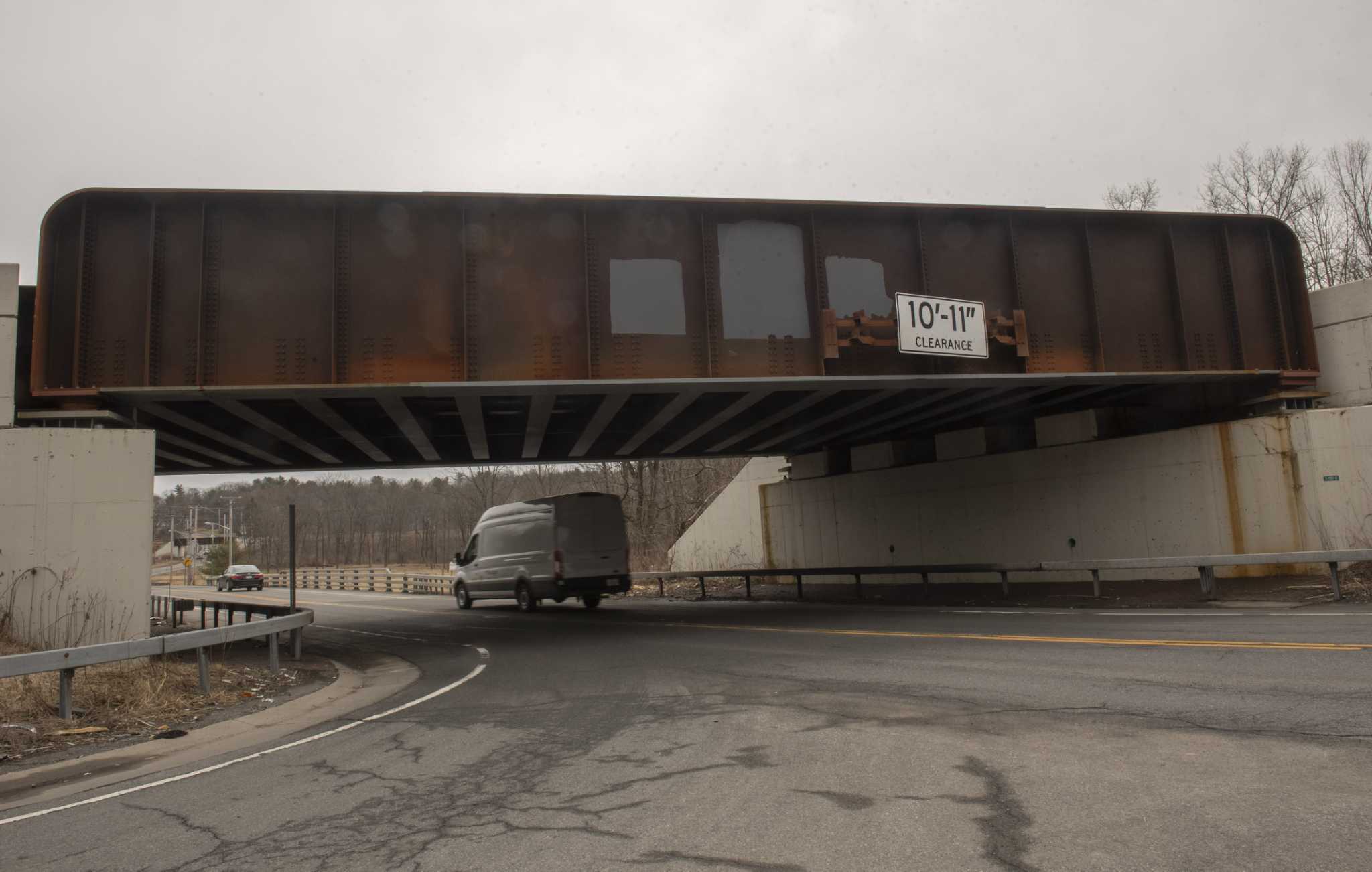 Report: Truck trailer top sheared off at Glenville overpass