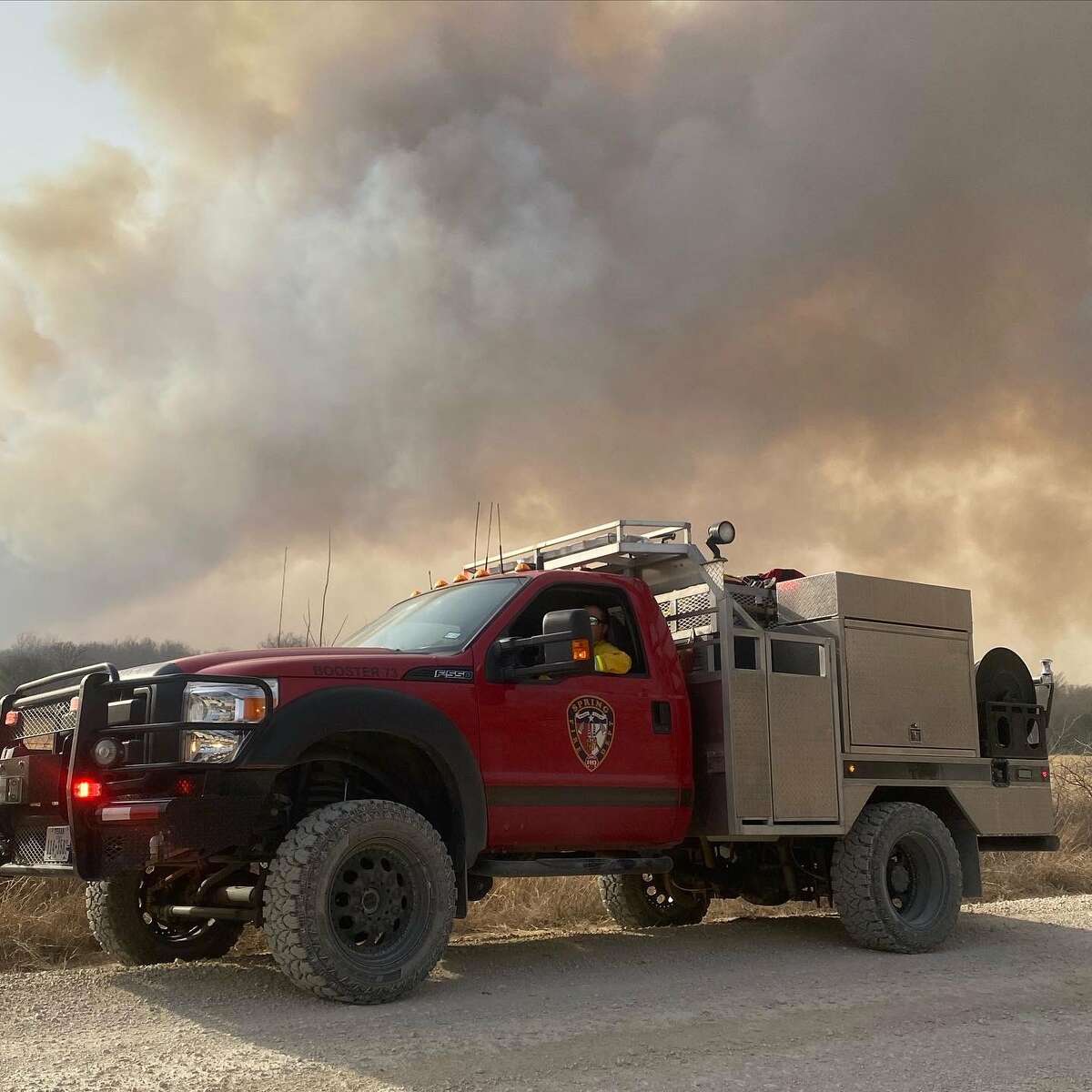 Photos show the Texas wildfires bringing smoky skies to Houston