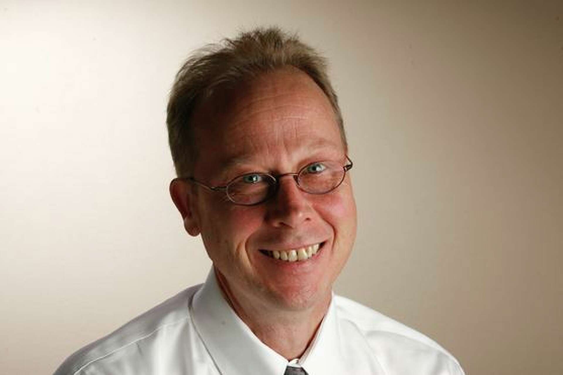 Longtime Chronicle editor Mark Lundgren, meticulous wordsmith and ...