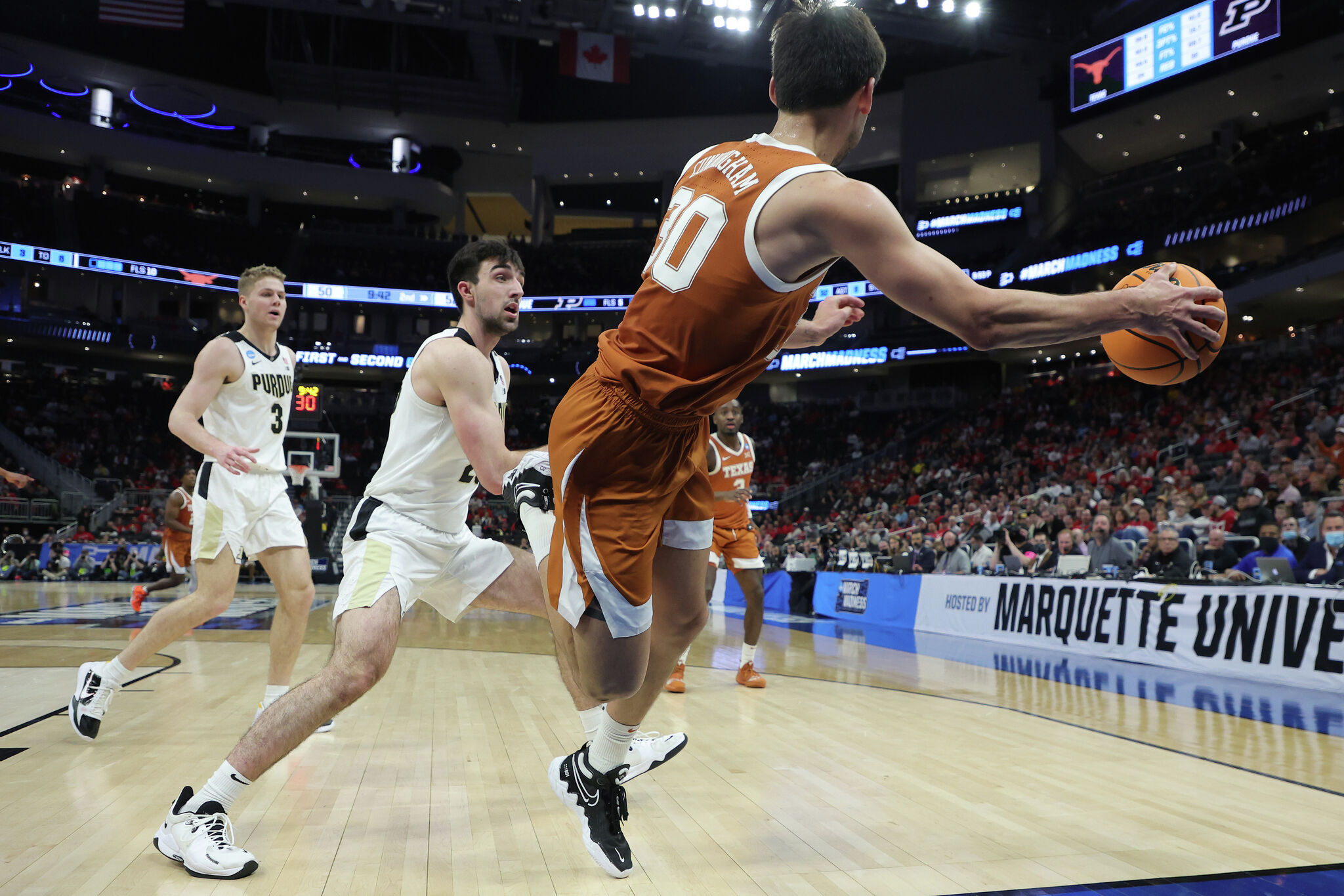 Texas forwards Christian Bishop, Brock Cunningham will return for 2022 ...