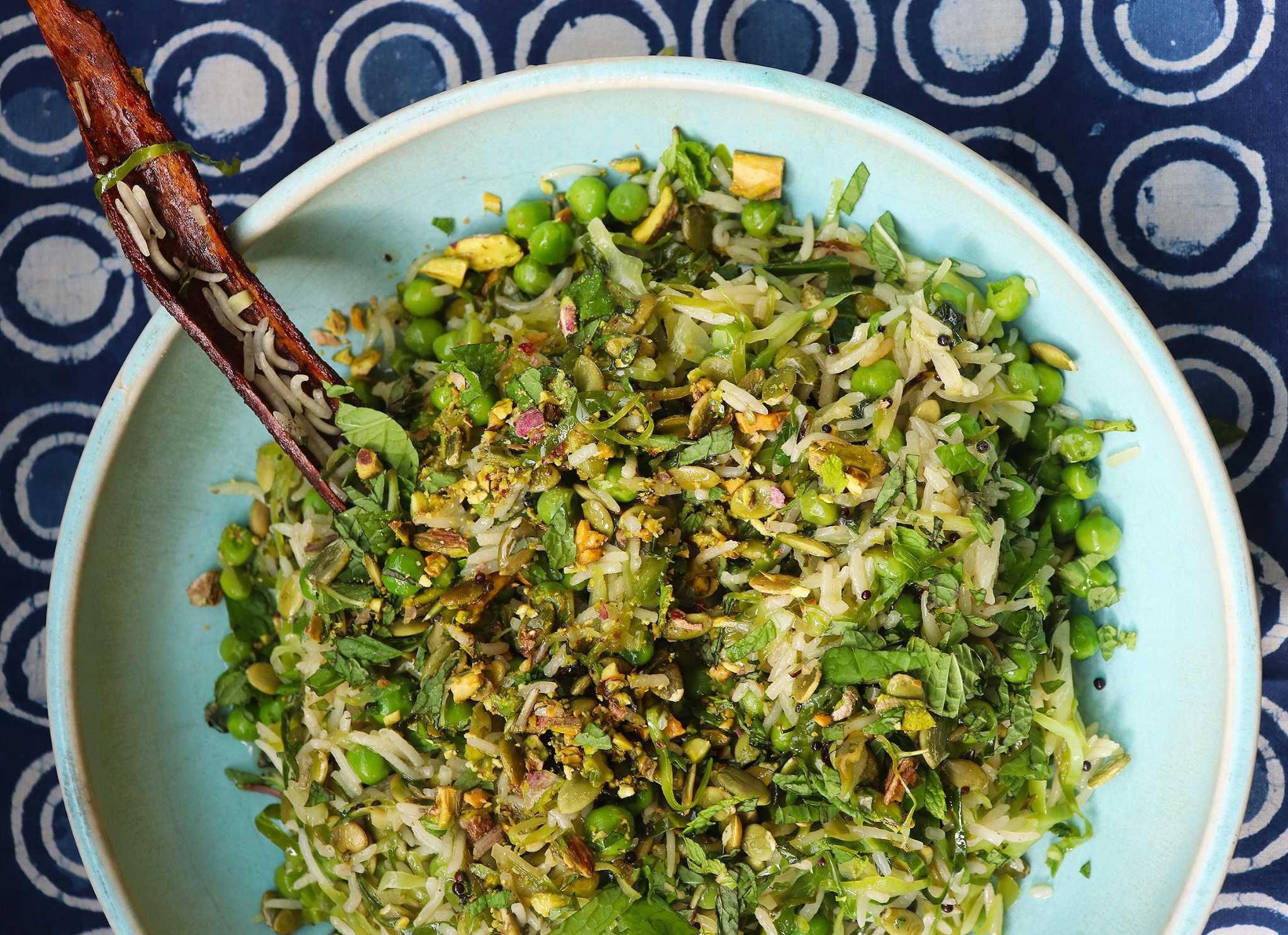 This spring pilaf uses more cabbage, less rice for healthier option