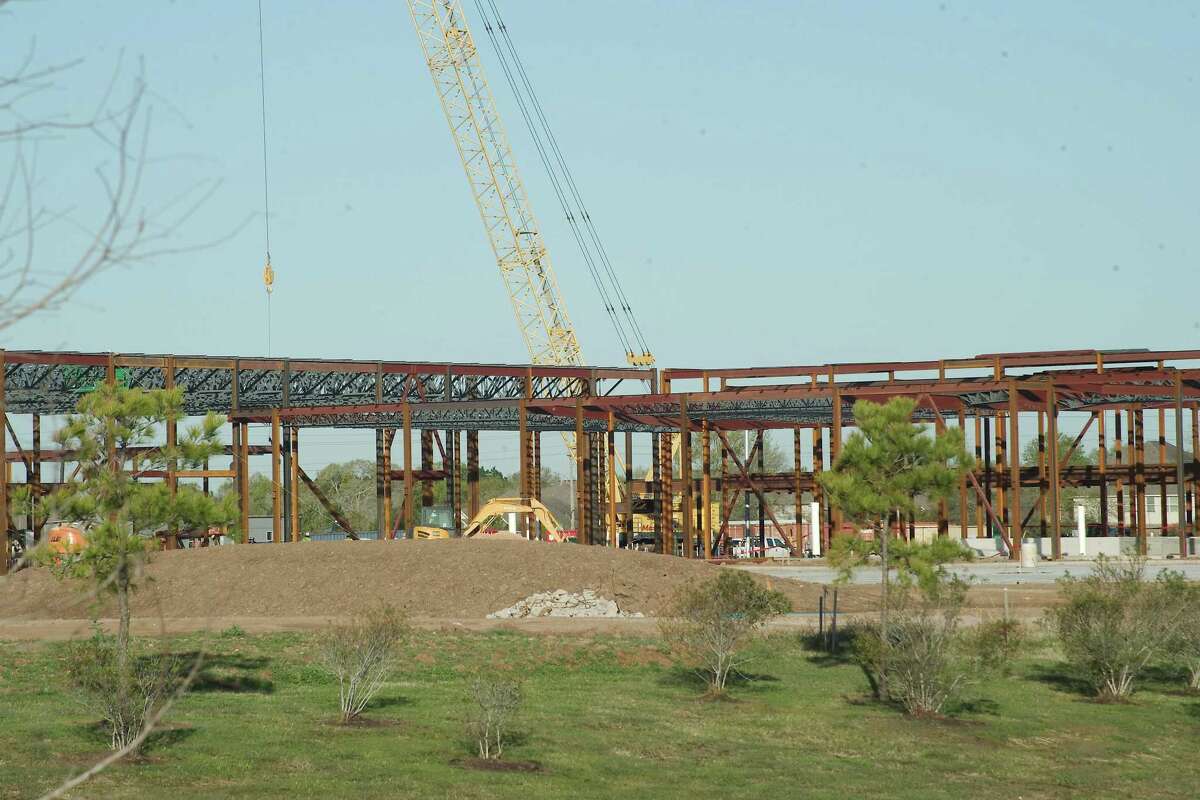 Frame for new Thompson school rises in South Belt