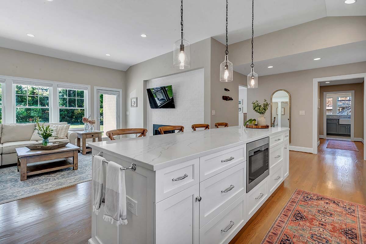 A modest ranch is expanded into a roomy coastal abode for the next ...