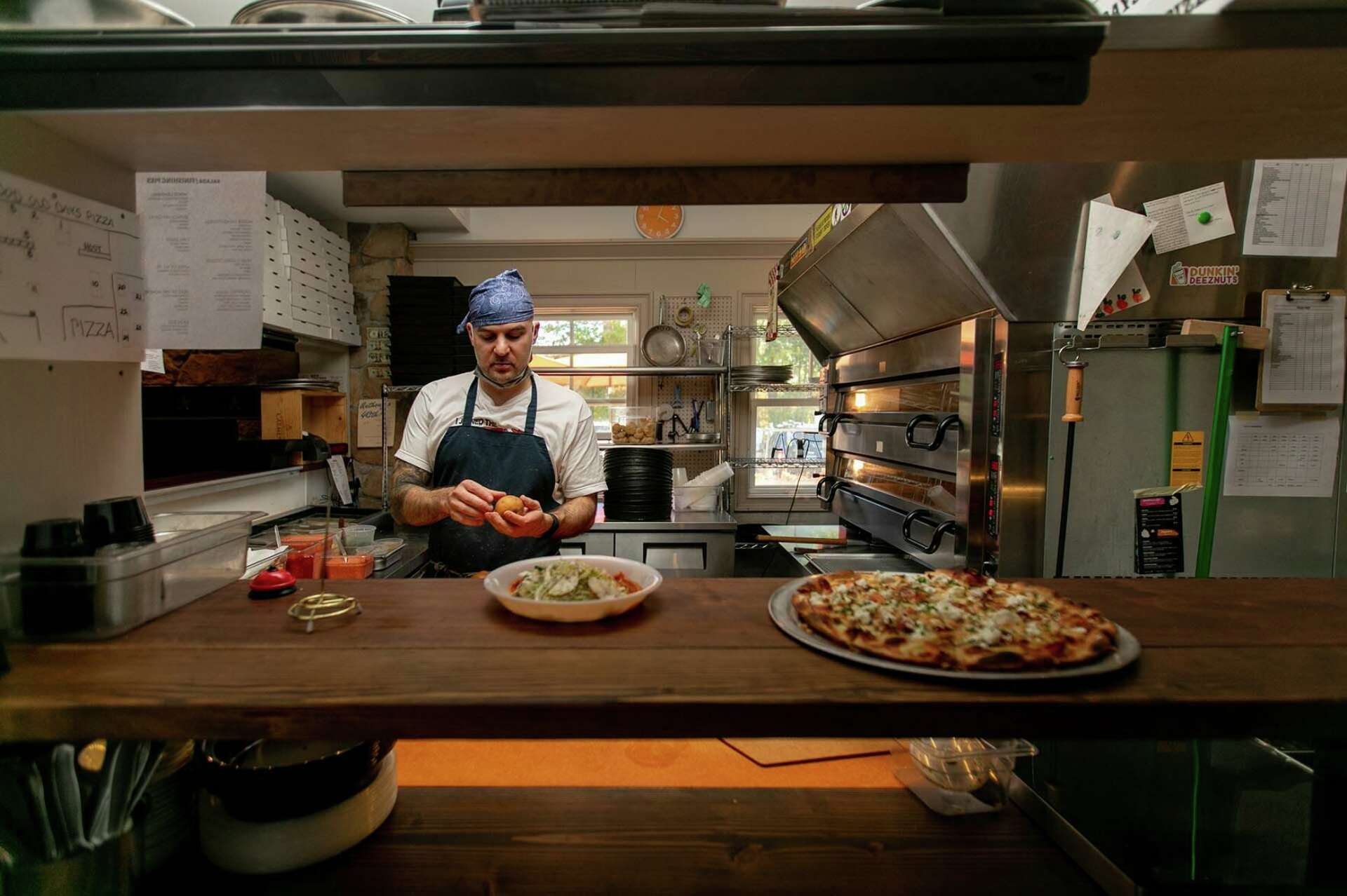 It's located in a basement, but Good Old Days’ pizzas are top of the line