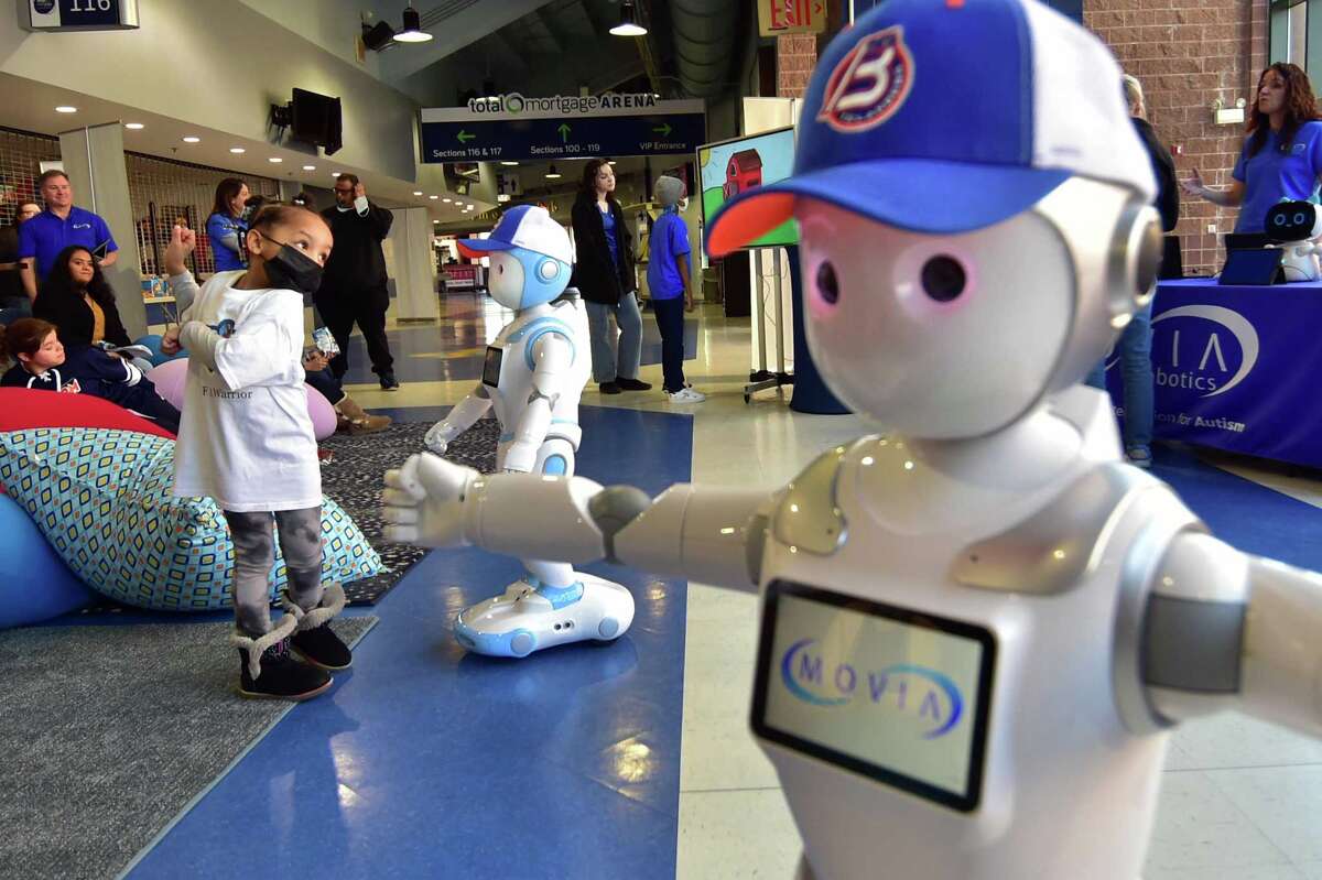 Photos: Bridgeport students get robot gift for World Autism Day