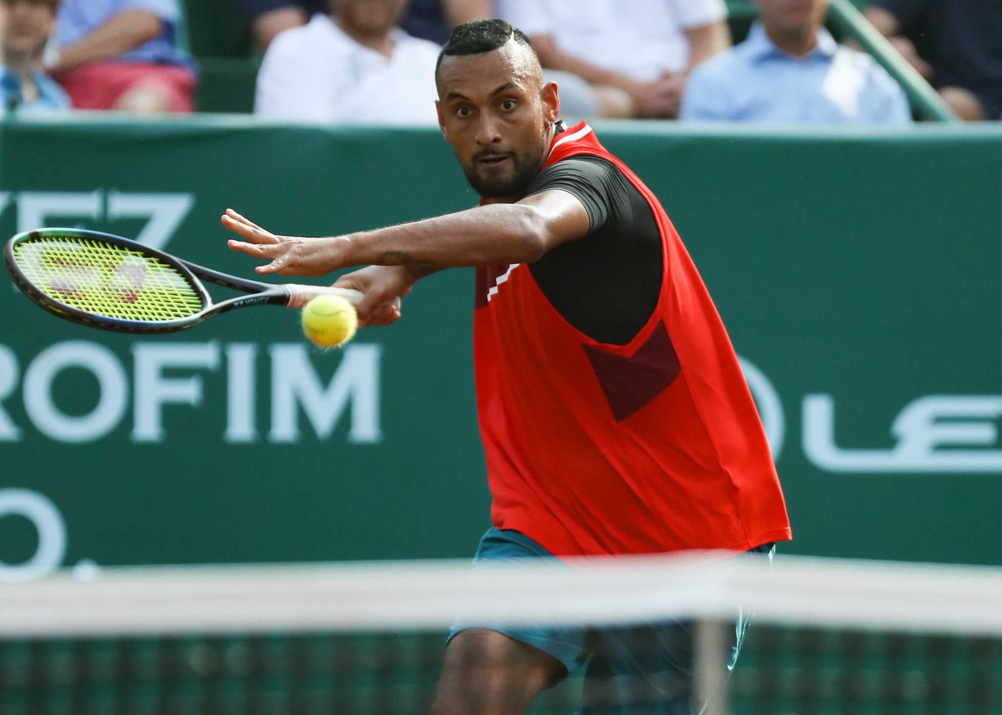 J.J. Wolf gets by with a little help from a friend at U.S. Clay Court ...