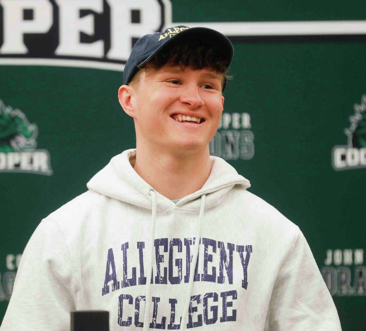 John Cooper football players receive SPC championship rings at signing day