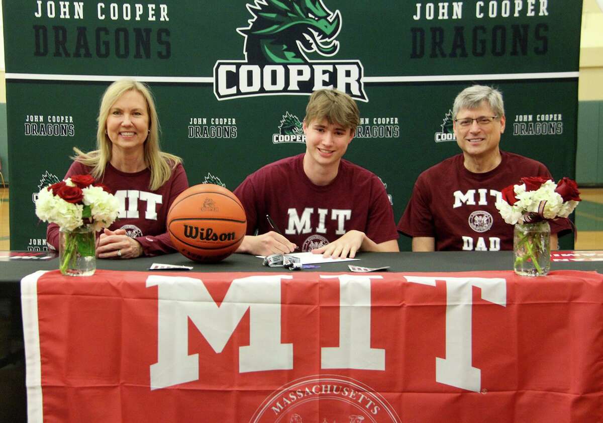 John Cooper football players receive SPC championship rings at signing day