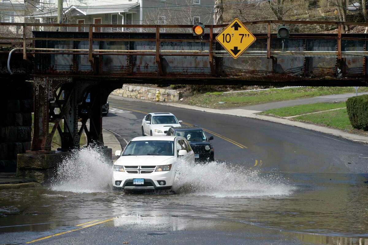 Photos: Still River floods some areas in Danbury, Brookfield