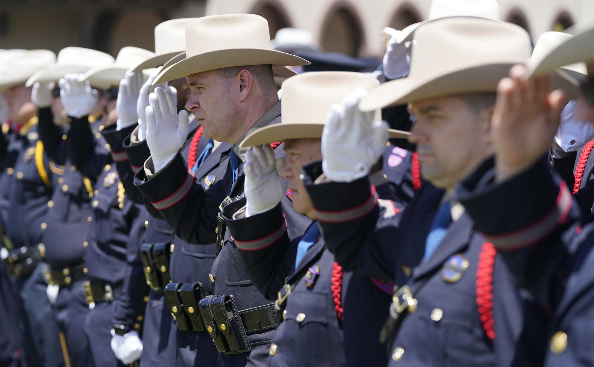 At funeral of slain Harris County deputy Darren Almendarez, his widow ...