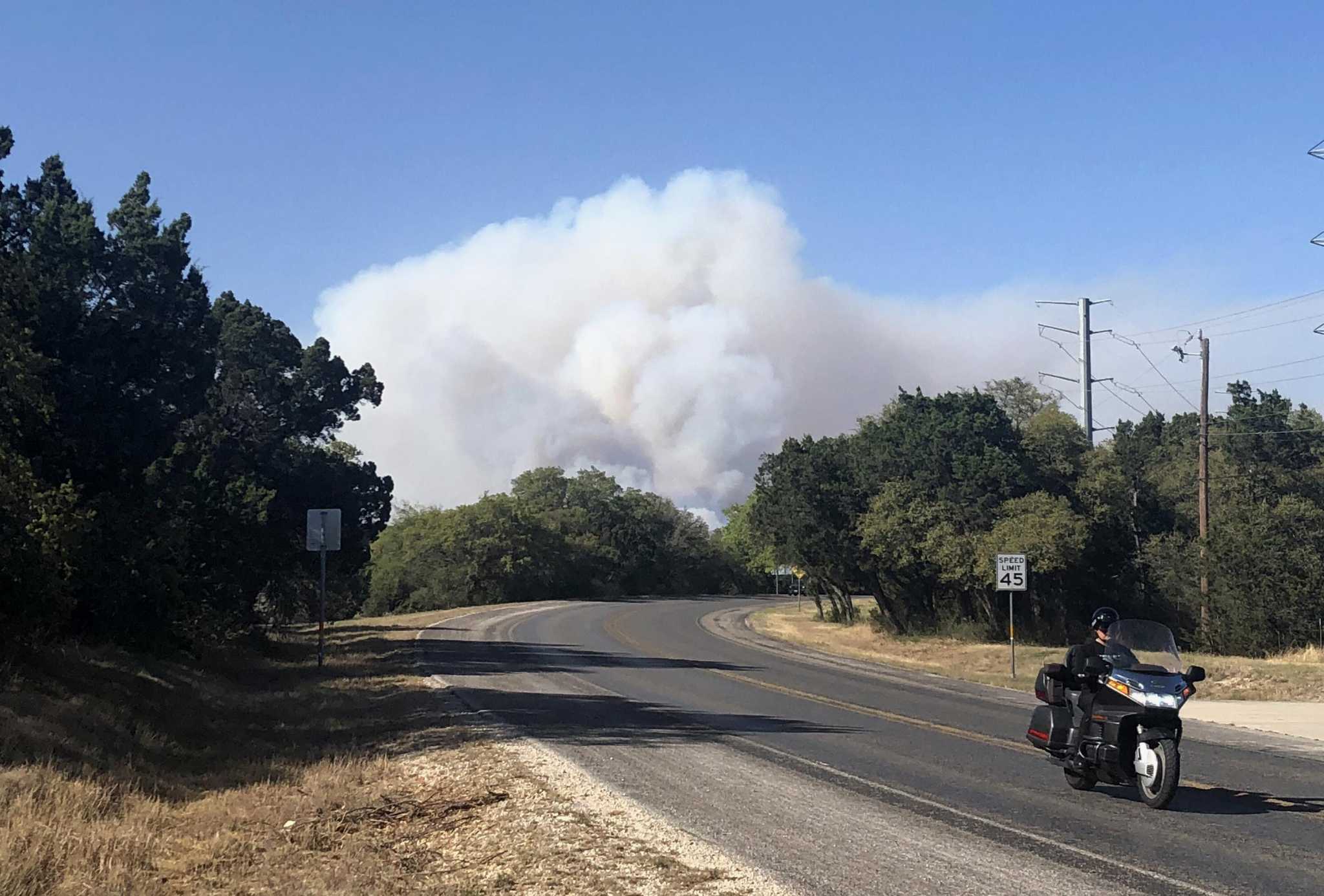 Residents evacuated as firefighters battle Camp Bullis blaze