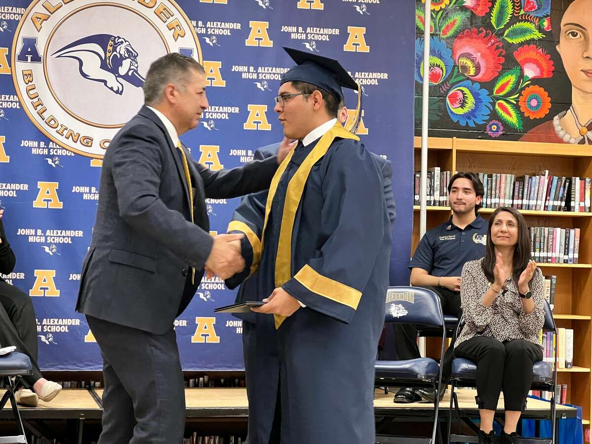 Alexander holds a special early graduation for their student