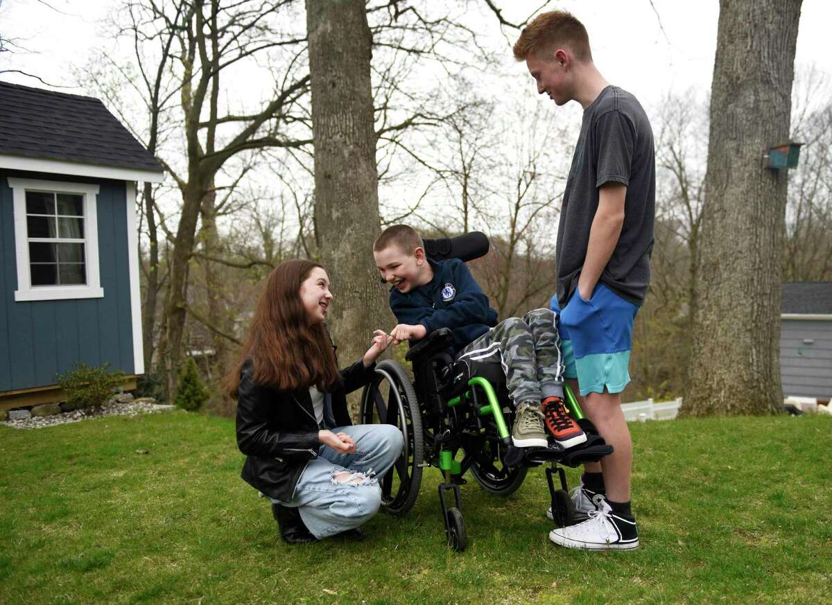 Mismatched shoes in Greenwich? 11-year-old’s classmates mimic his style ...