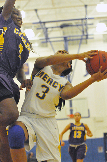 Girls basketball: Fitzpatrick leads No. 2 Mercy over No. 3 Career