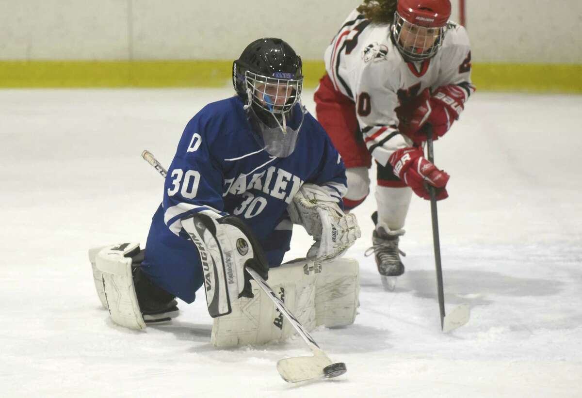 Darien and New Canaan skate to 1-1 tie in rivalry thriller